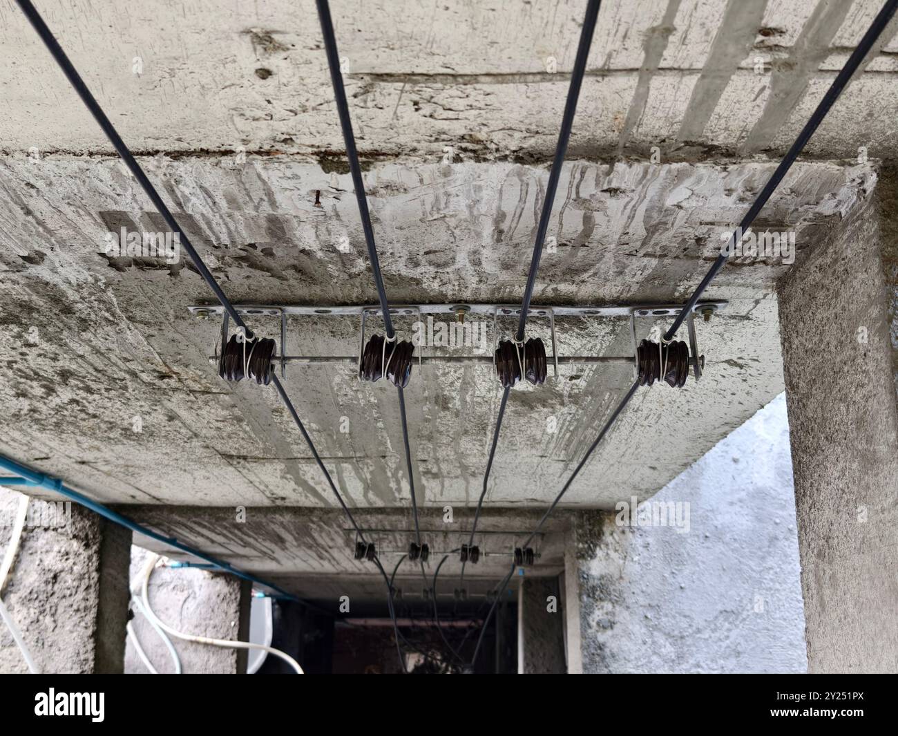 Cables in an elevator shaft at a new building construction site Stock ...