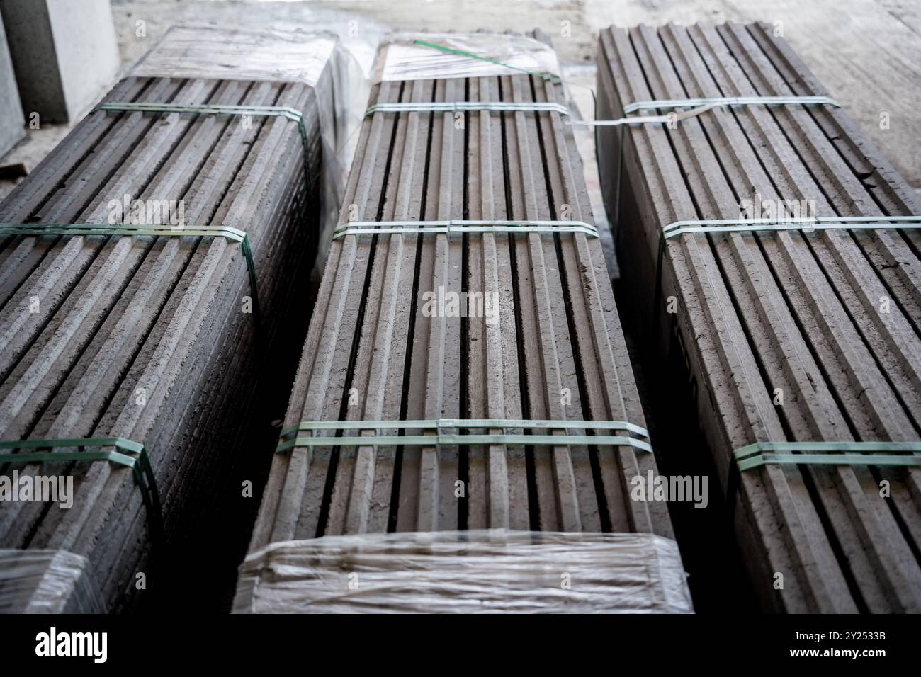 A large stack of concrete slabs on a construction site Stock Photo - Alamy