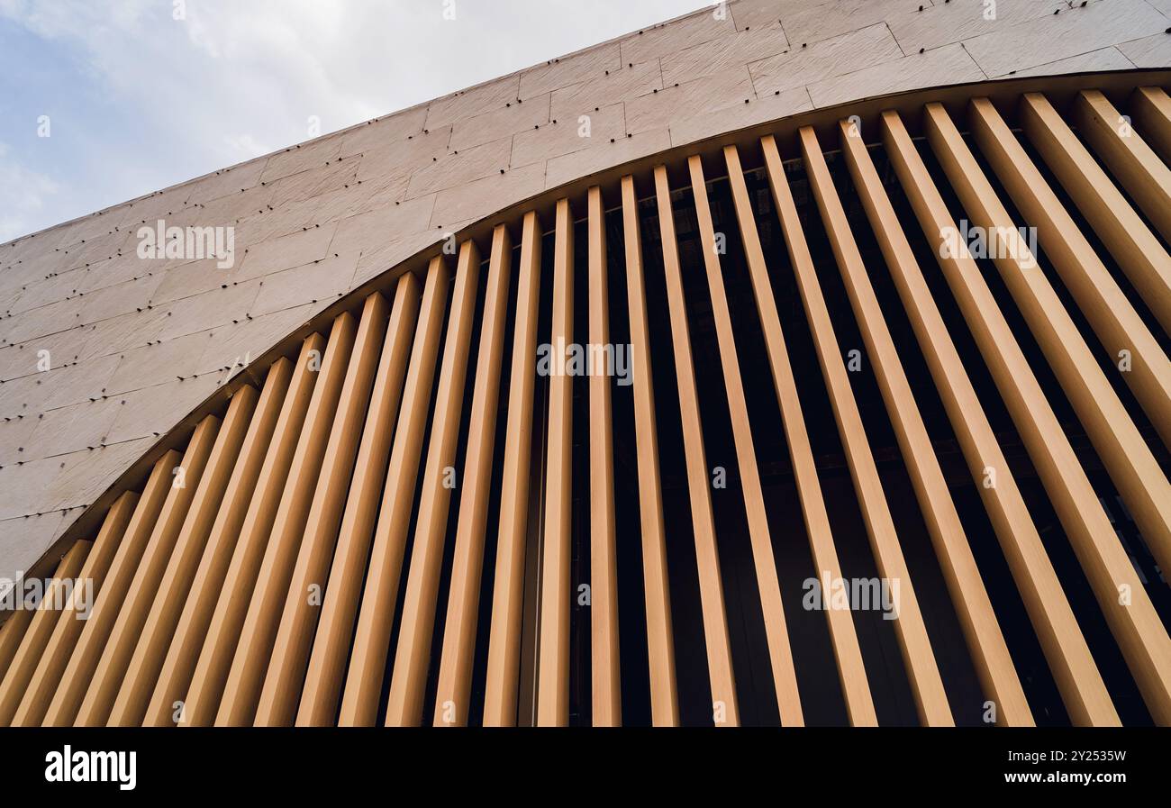 A structure featuring wooden slats on construction site contributing to ...