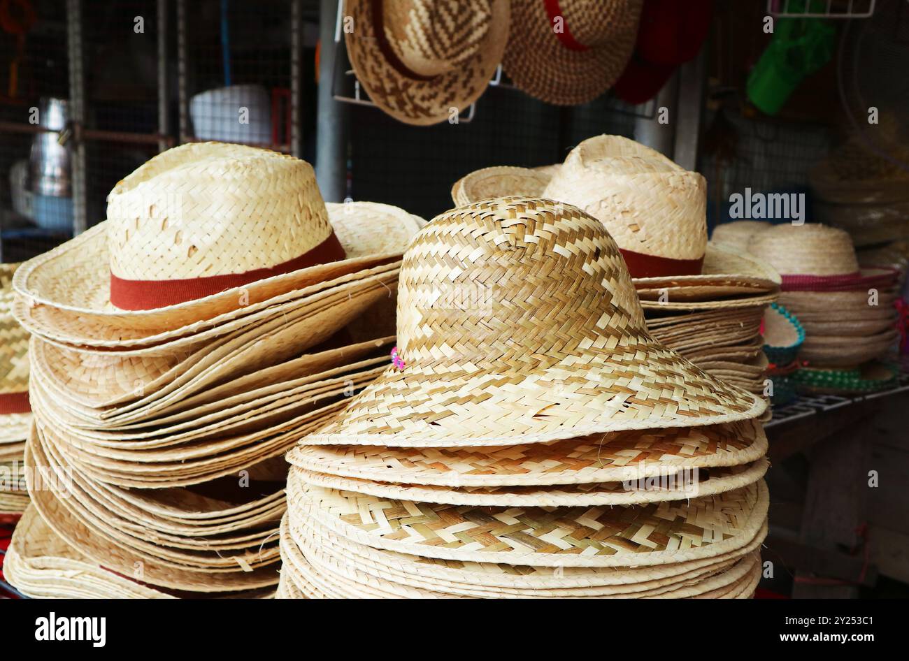 Stacks of natural color fashionable straw hats in the hat shop Stock ...