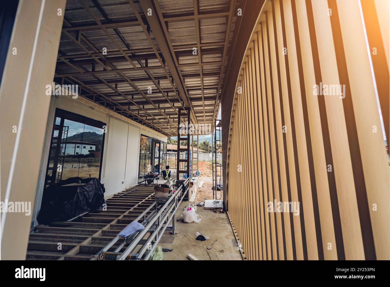 A structure featuring wooden slats on construction site contributing to ...