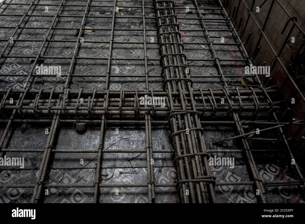 A construction site displaying a reinforced concrete foundation with ...