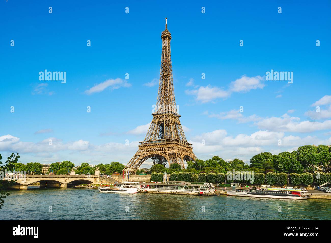 Eiffel Tower at the left bank of Seine river in Paris, France Stock ...