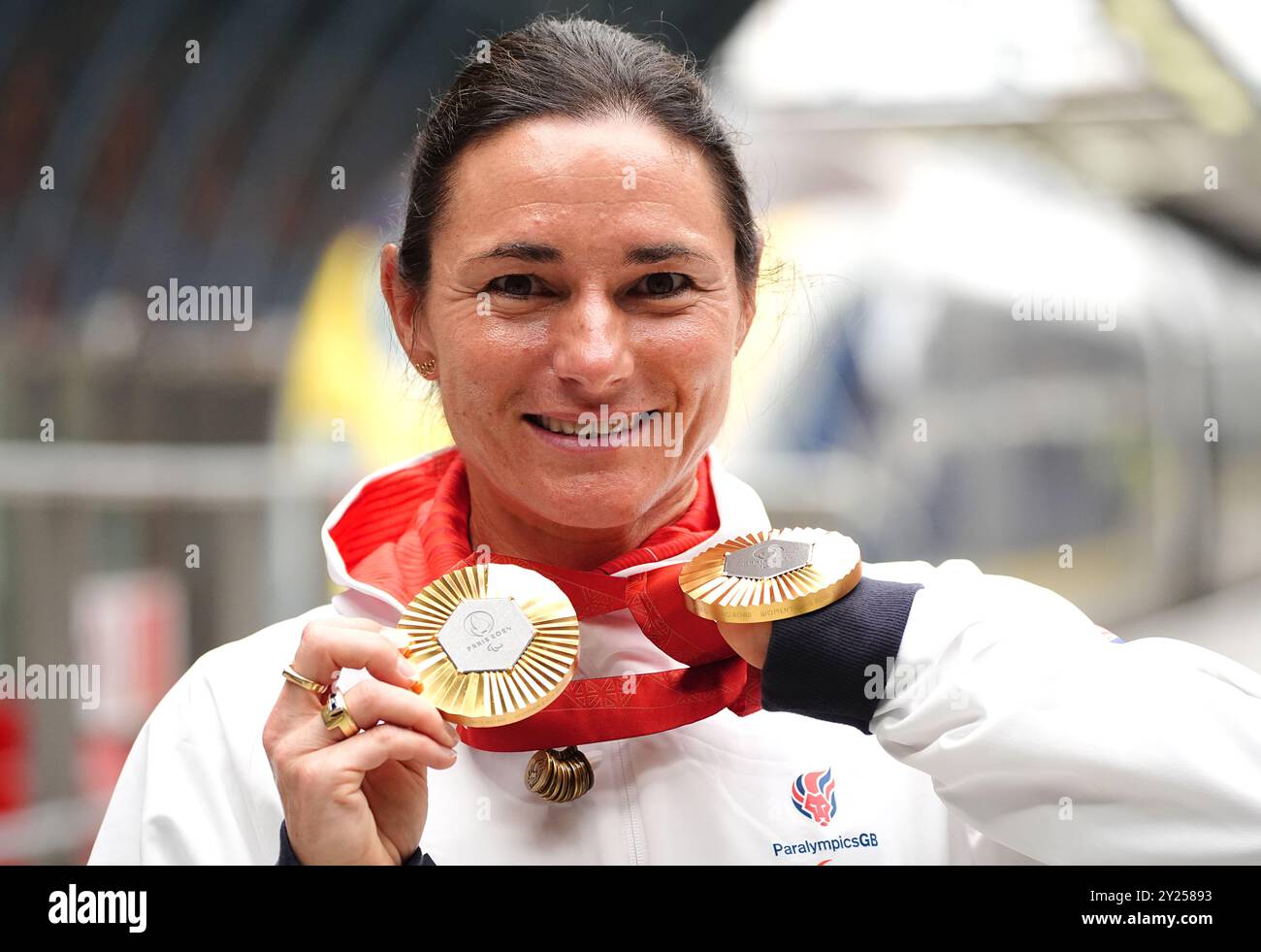 Great Britain's Sarah Storey poses with her two gold medals after ...