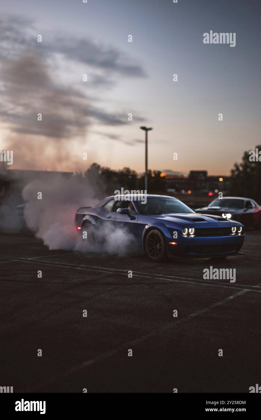 Dodge Challenger SRT Hellcat indigo Blue doing Burnout Stock Photo - Alamy