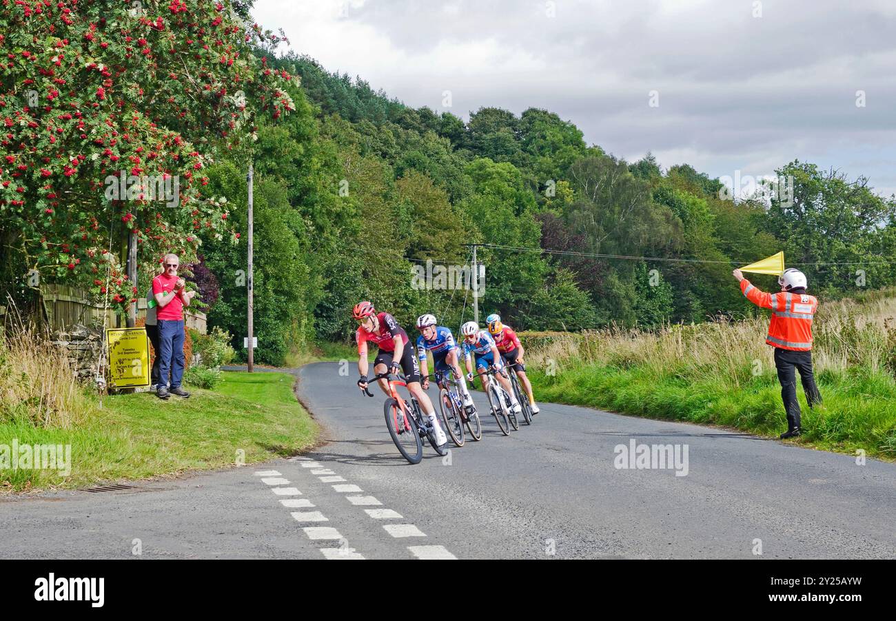 Ben Turner and Gil Gelders lead a small group of riders ahead of the ...