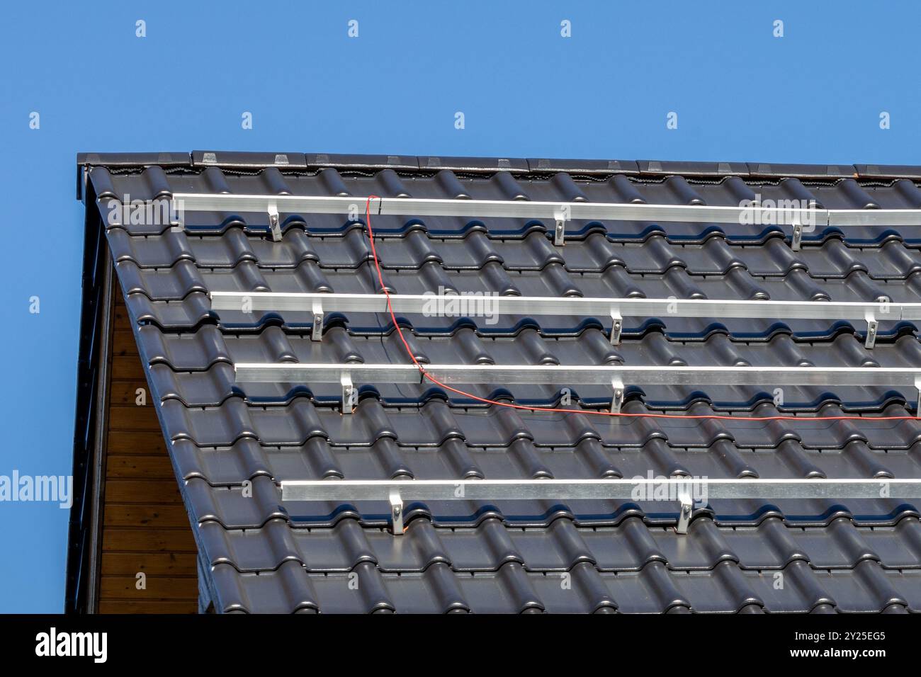 Solar Panel Mounting Frame on Tiled Roof Stock Photo - Alamy