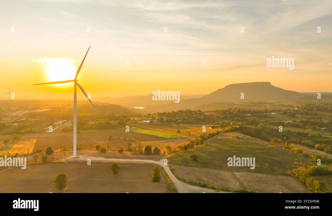 Wind farm field and sunset sky. Wind power. Sustainable, renewable ...