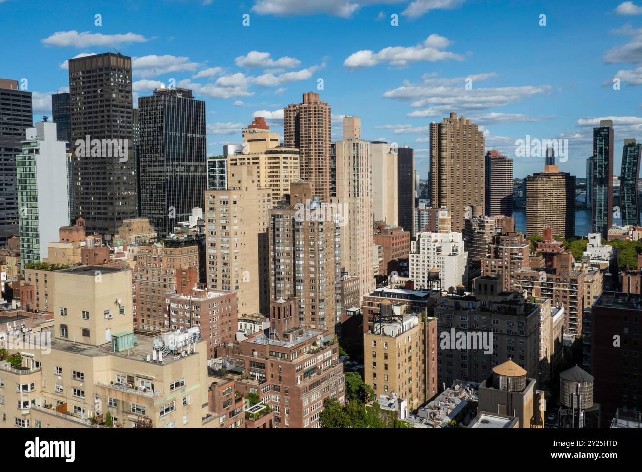 View of Manhattan Midtown skyline from a luxury co-op apartment roof ...