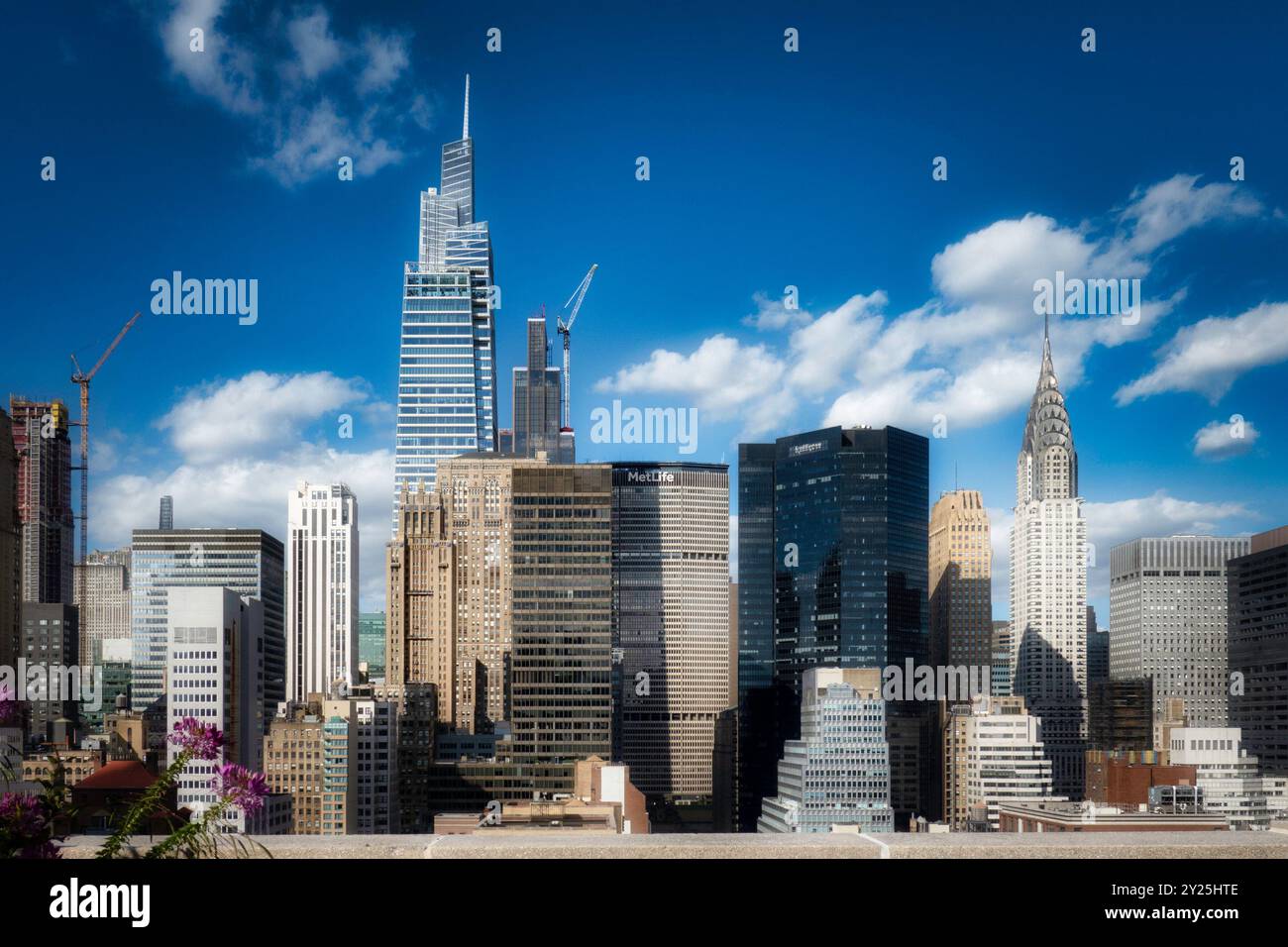 View of Manhattan Midtown skyline from a luxury co-op apartment roof ...