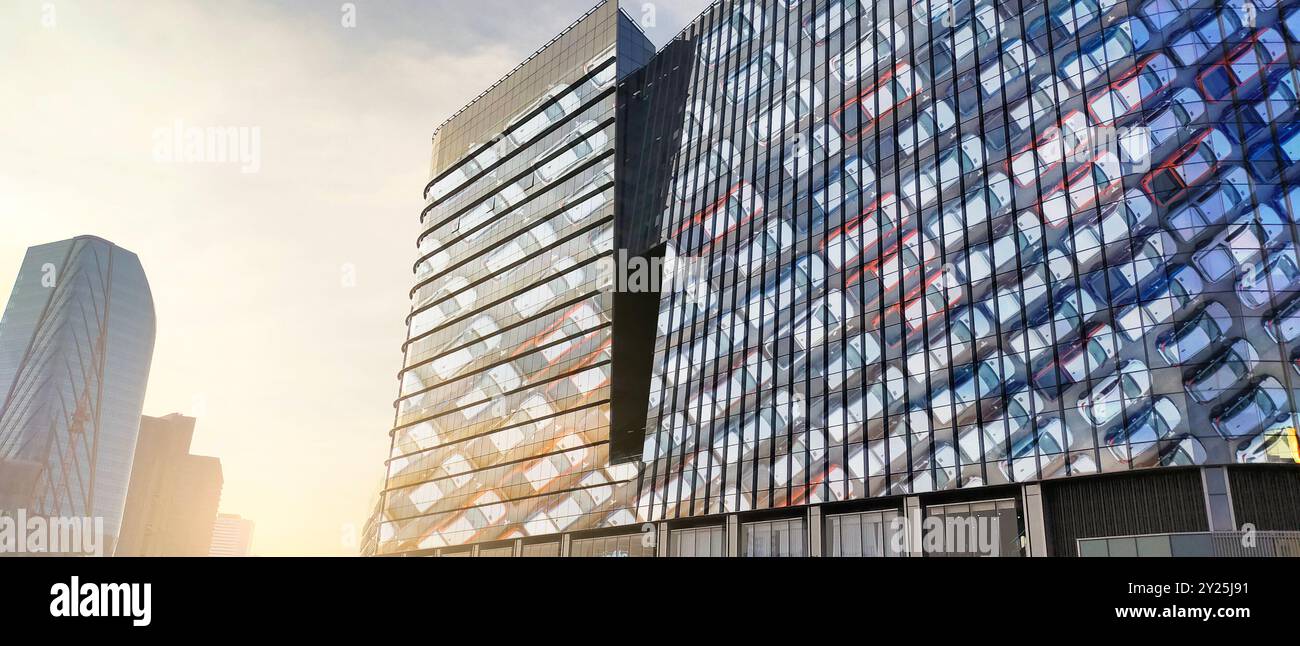 Modern headquarters of electric and hybrid car manufacturer. Glass ...