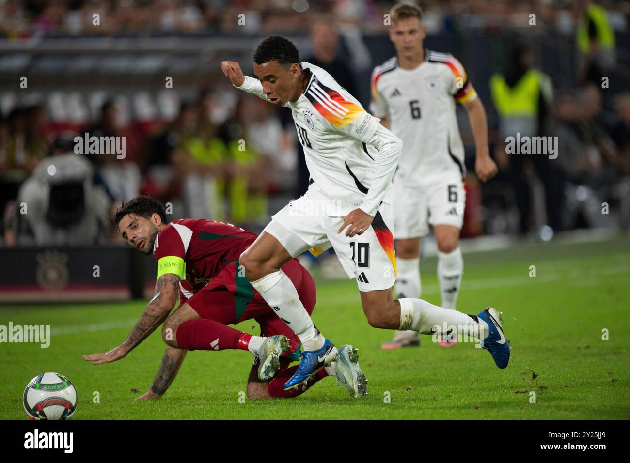 Jamal MUSIALA (GER) versus SZOBOSZLAI Dominik (HUN) action, duels ...