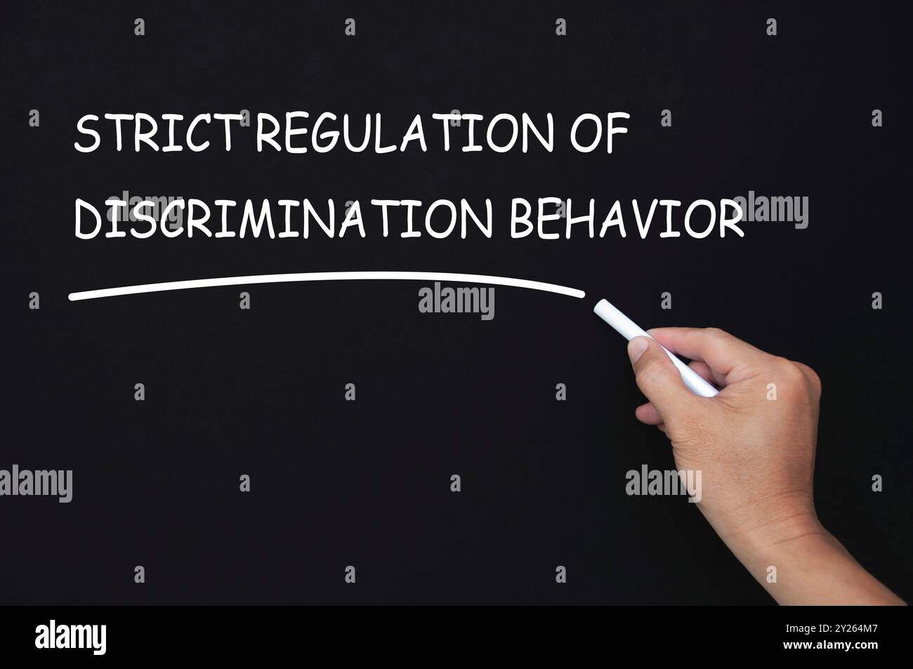 Strict regulation of discrimination behavior text written on blackboard ...