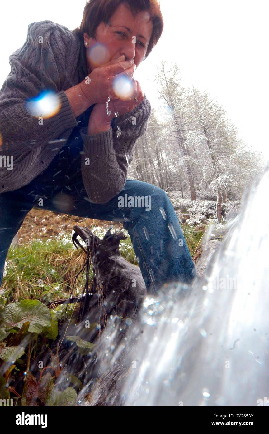 Drinking water and refresh on a trekking tour Drinking water on a ...