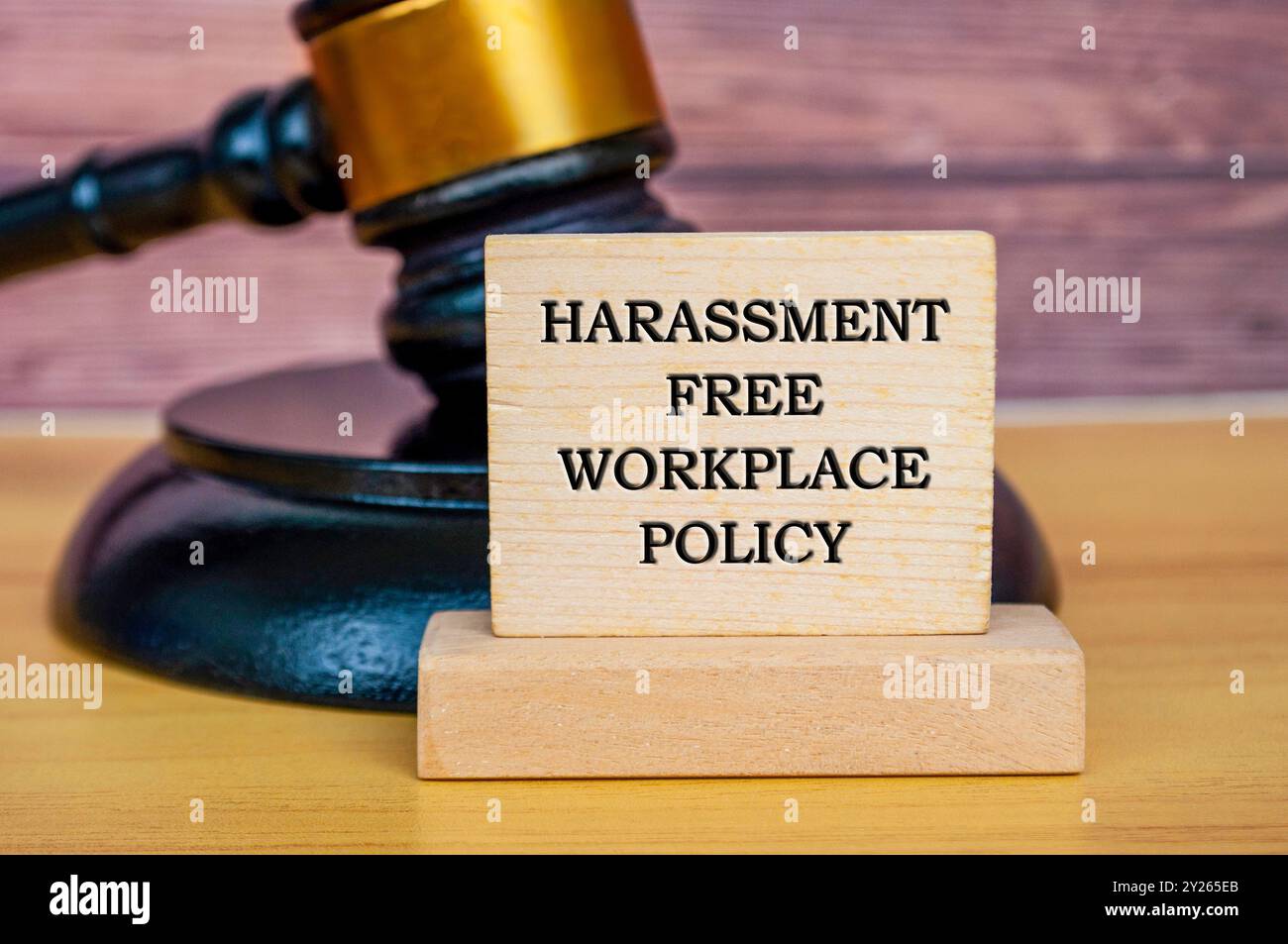 Harassment free workplace policy text written on wooden board with ...