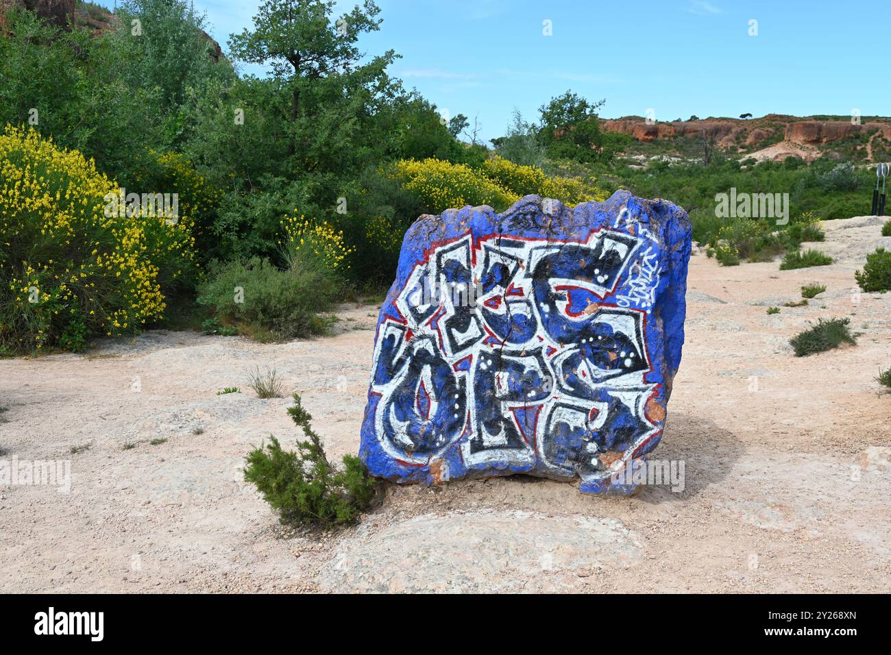 Painted Blue Rock, Boulder or Rural Graffiti Among the Red or Ochre ...