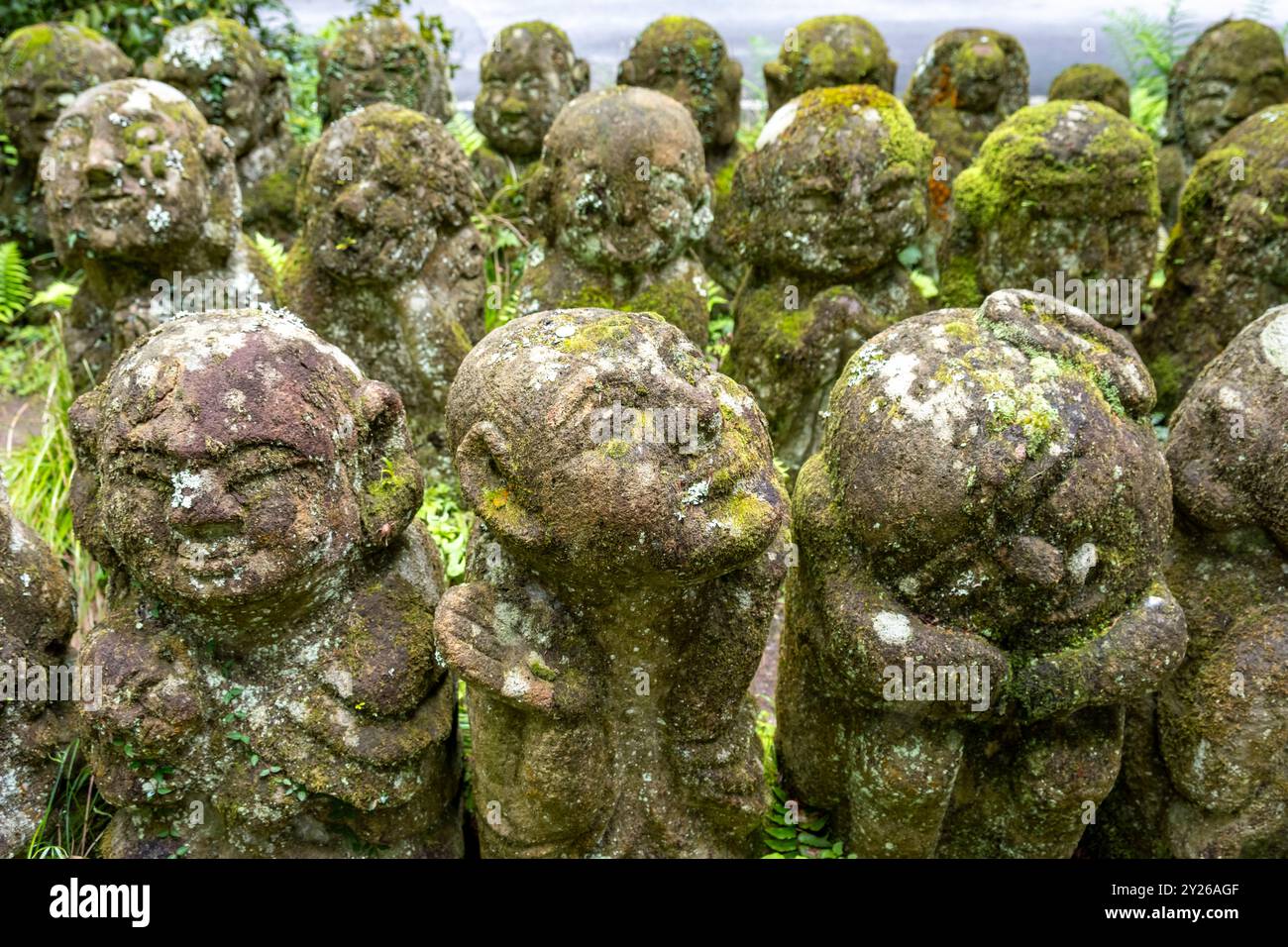 Moss-covered stone statues of rakans - the disciples of Buddha, Otagi ...