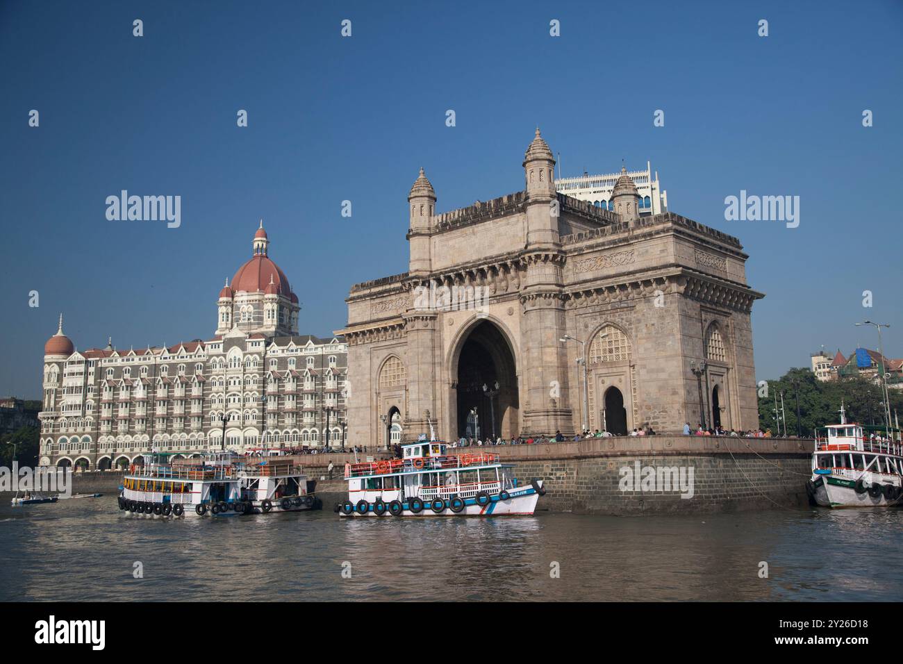 The Taj Mahal Palace Hotel and the 'Gateyway of India' building in Mumbai harbour, Mumbai, India ...