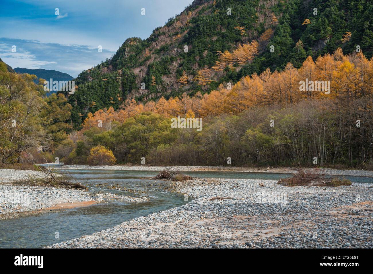 Nature landscape at Kamikochi Japan of autumn foliage with pond and ...
