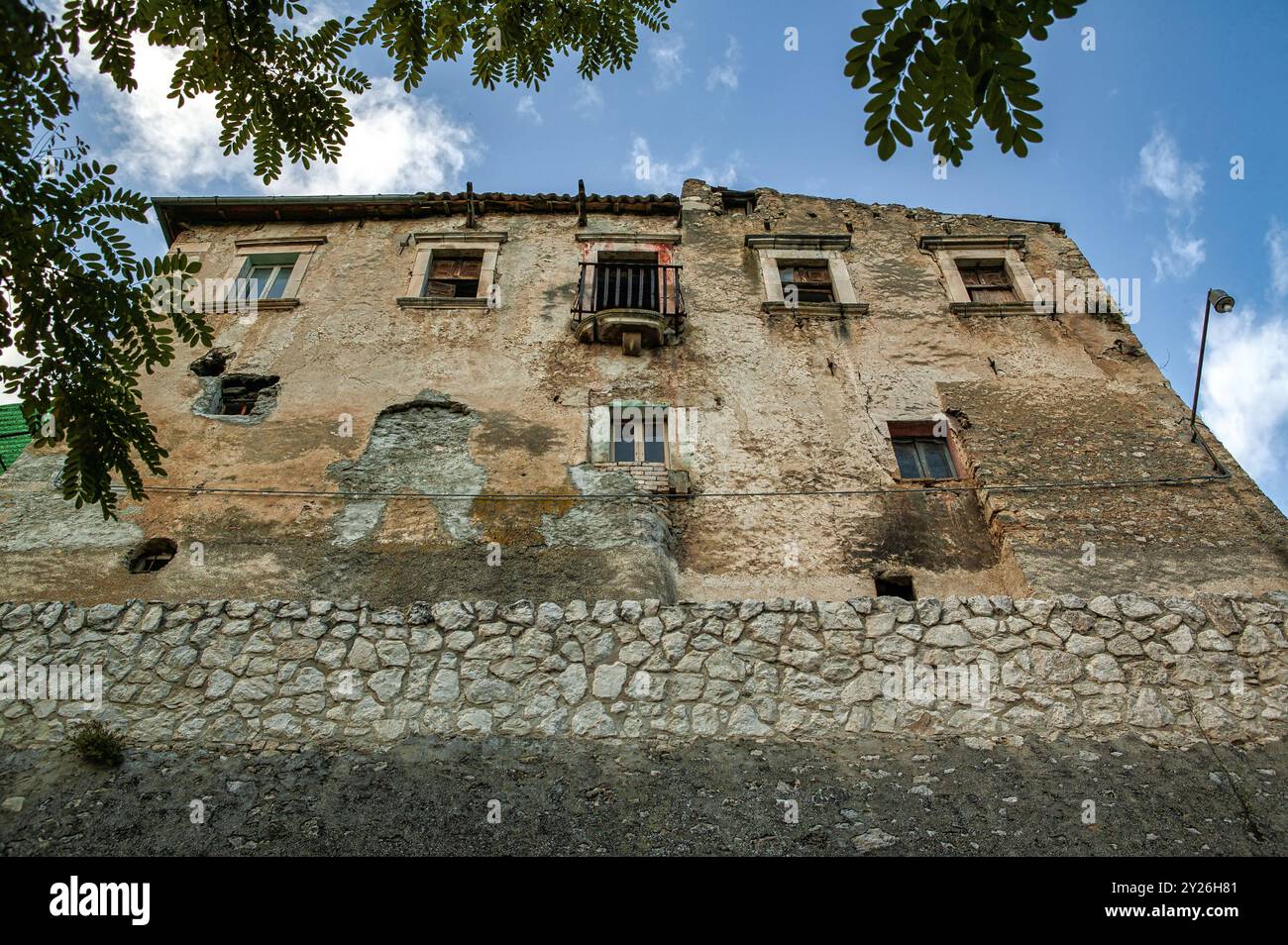 Ancient ruined houses along the walls of the ancient village of ...