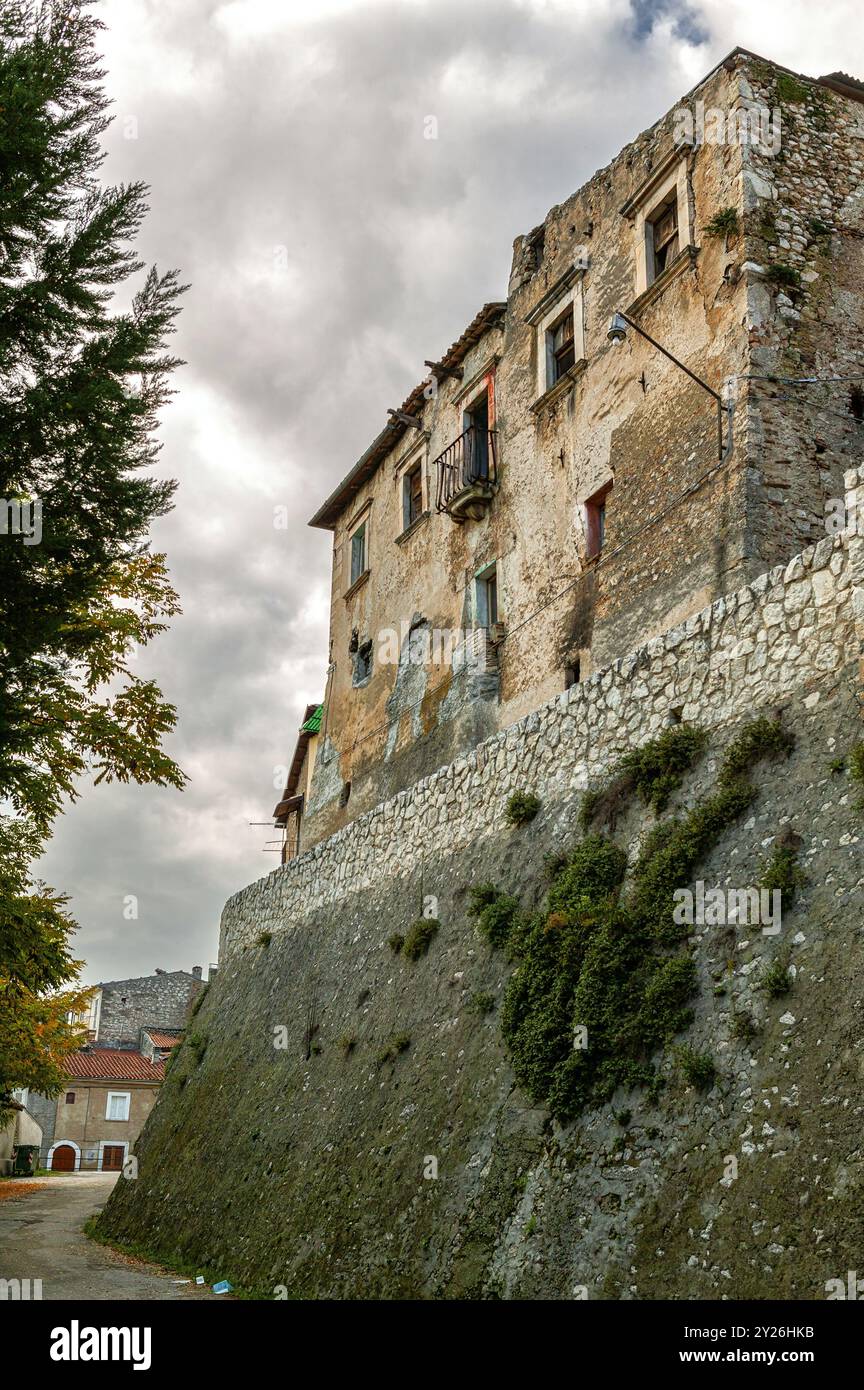 Ancient ruined houses along the walls of the ancient village of ...