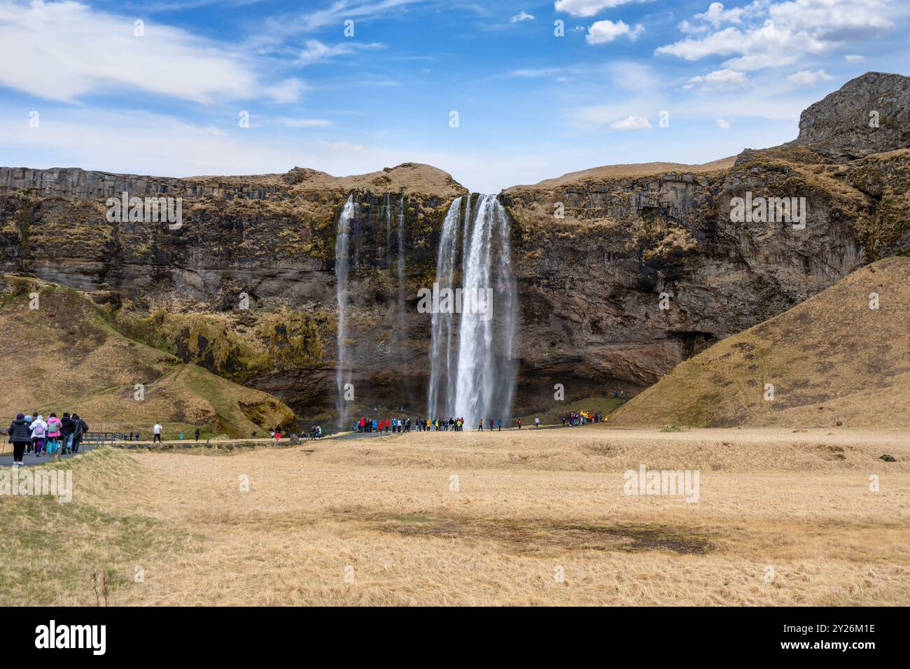 Seljalandsfoss Waterfall, Iceland - May 5, 2024: Tourists marvel at ...