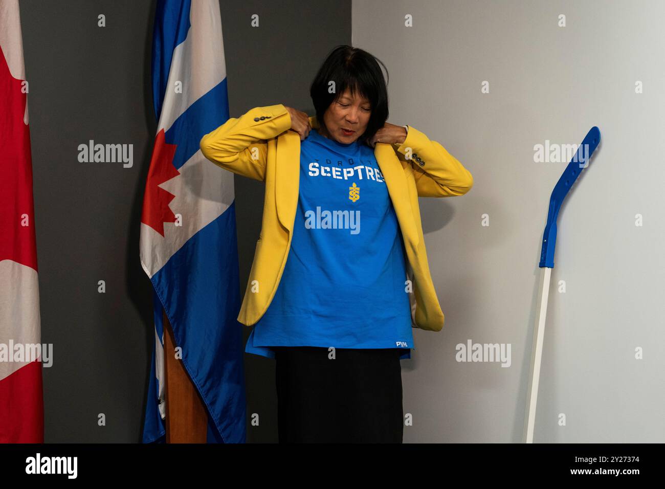 Toronto, Canada. 22nd Aug, 2024. Toronto Mayor Chow puts on her jacket ...