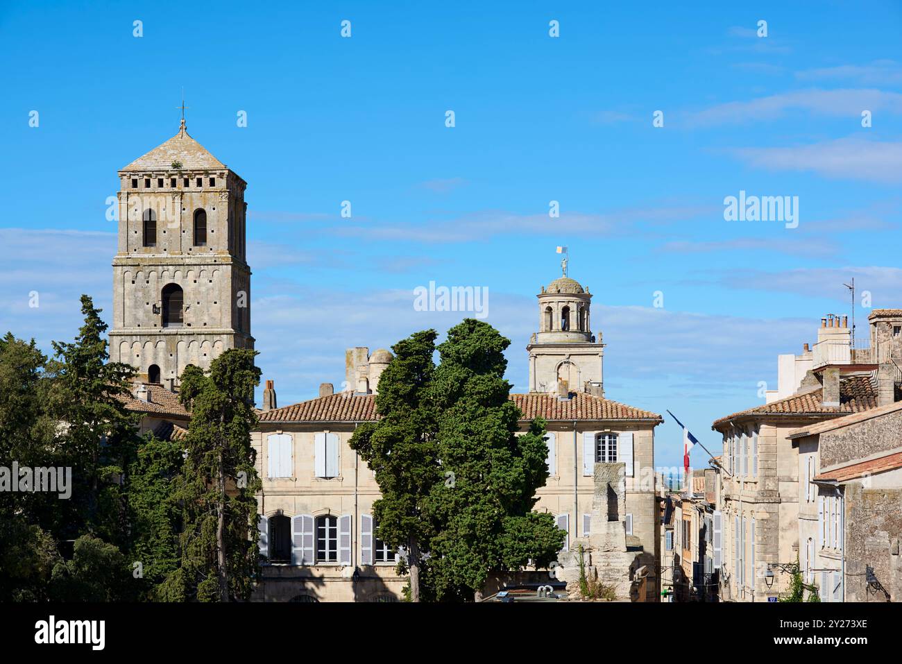 Skyline in central Arles, Provence, France, including the tower of St Trophime church, looking ...