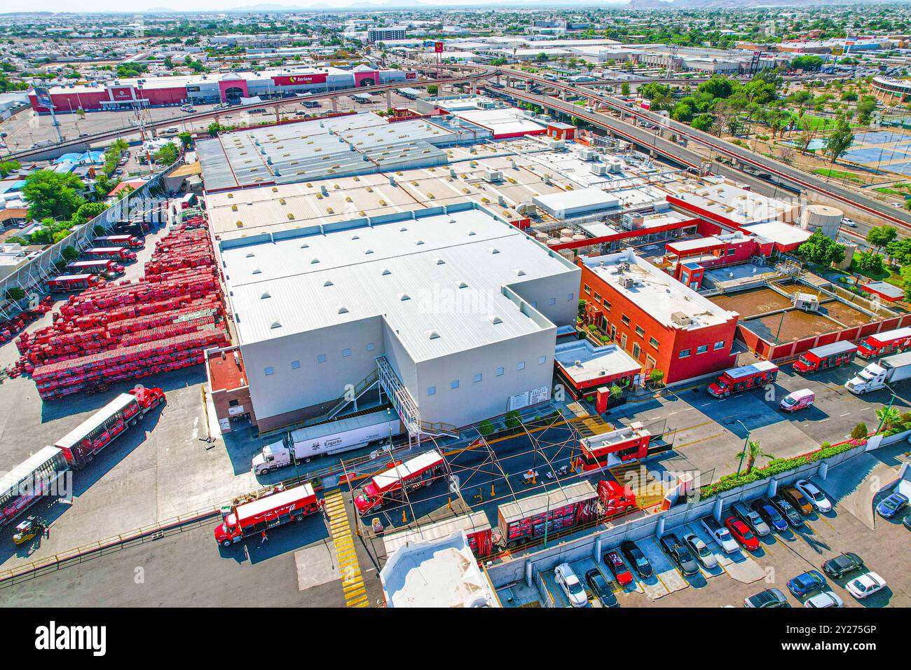 Red Coca Cola trucks or The Coca-Cola Company aerial view of the soda ...
