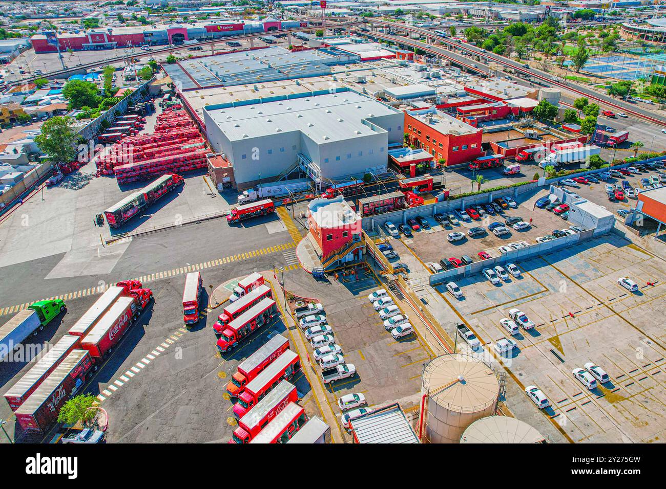 Red Coca Cola trucks or The Coca-Cola Company aerial view of the soda ...
