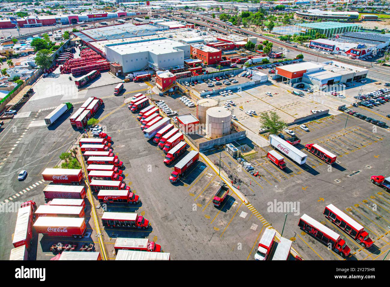 Red Coca Cola trucks or The Coca-Cola Company aerial view of the soda ...