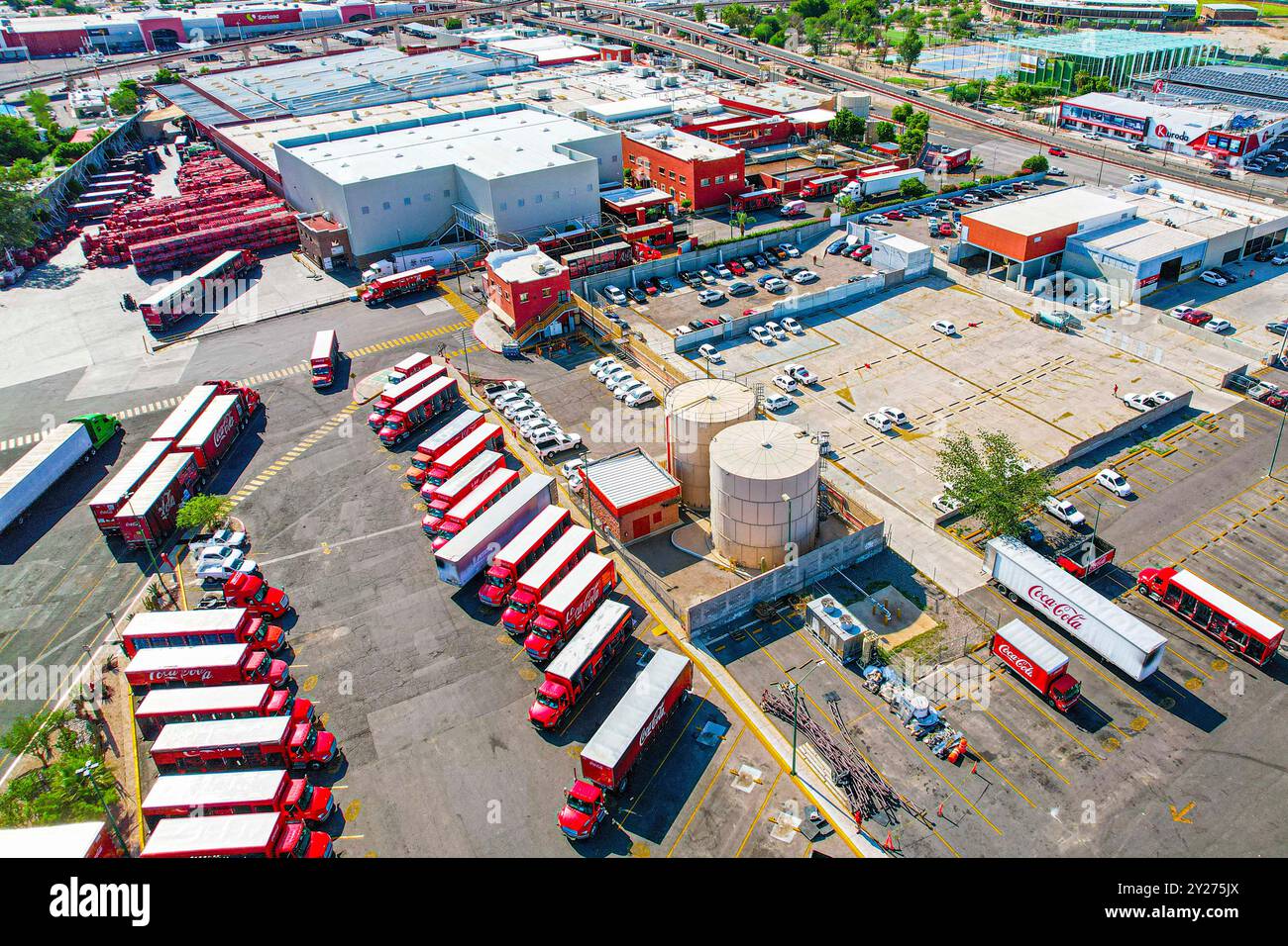 Red Coca Cola trucks or The Coca-Cola Company aerial view of the soda ...