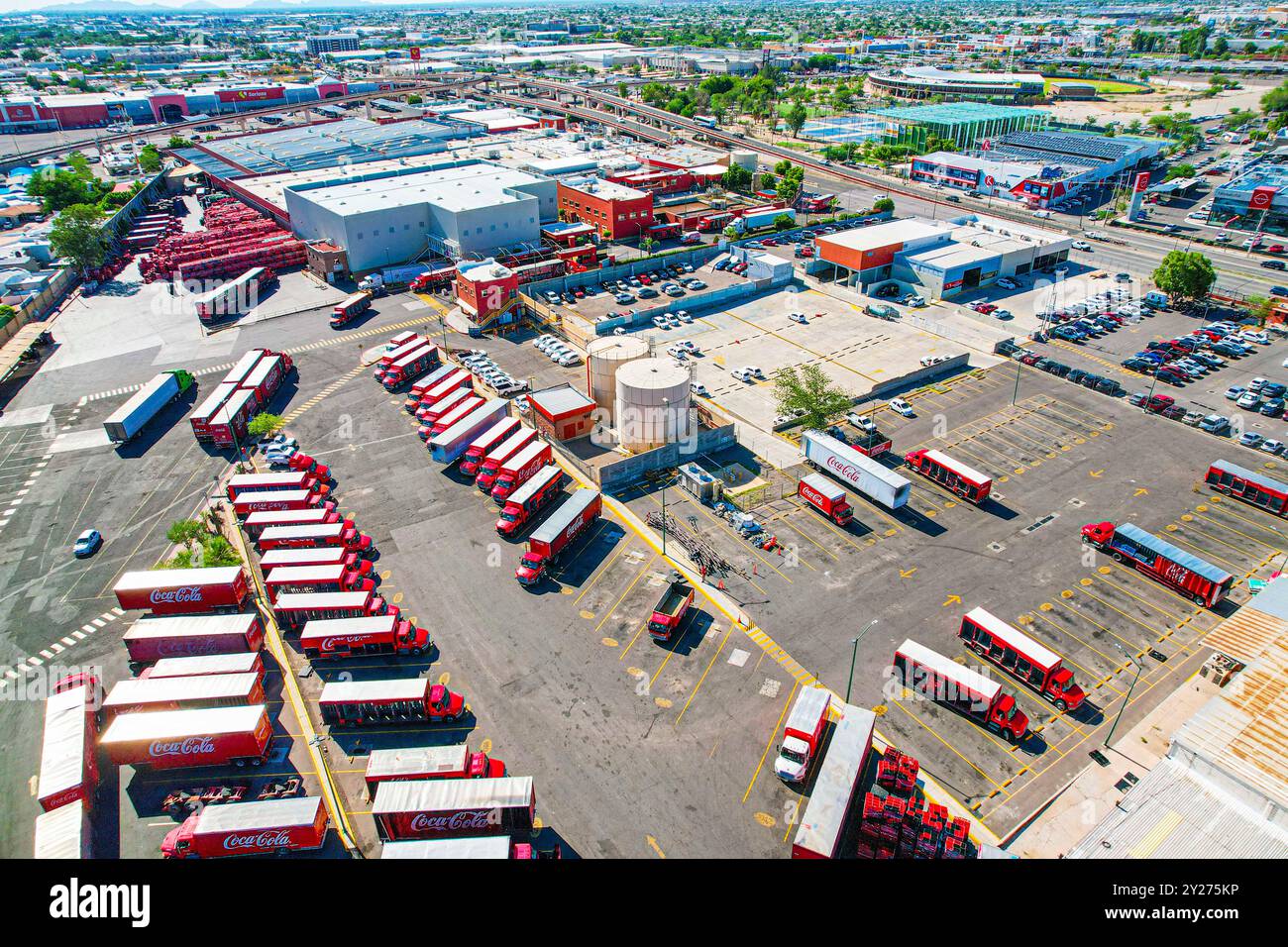 Red Coca Cola trucks or The Coca-Cola Company aerial view of the soda ...