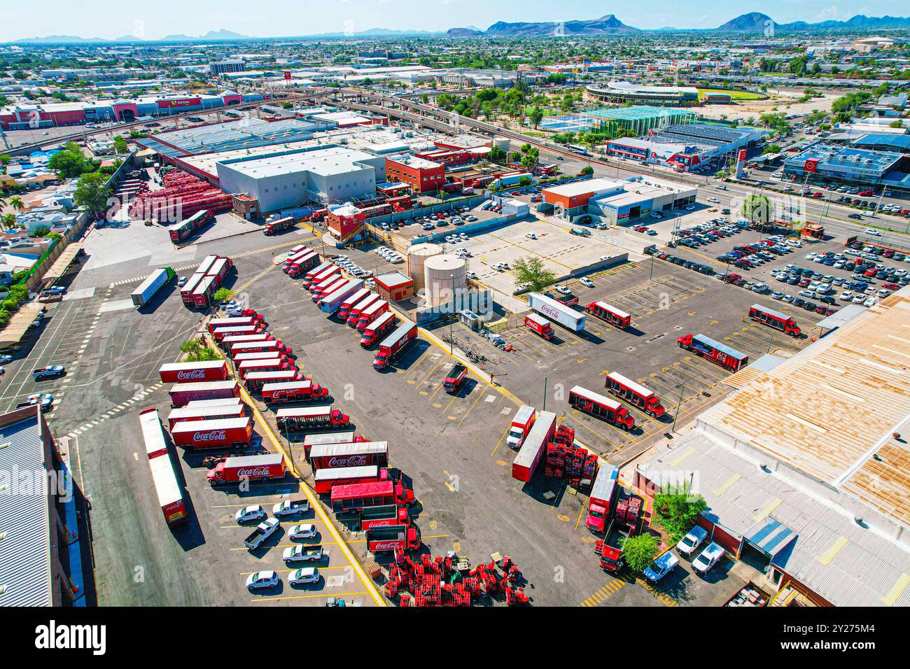 Red Coca Cola trucks or The Coca-Cola Company aerial view of the soda ...