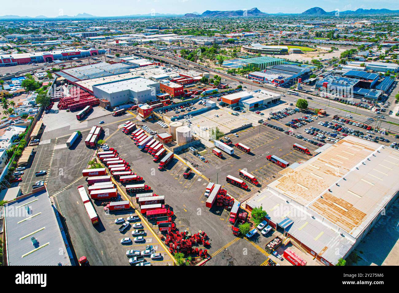 Red Coca Cola trucks or The Coca-Cola Company aerial view of the soda ...
