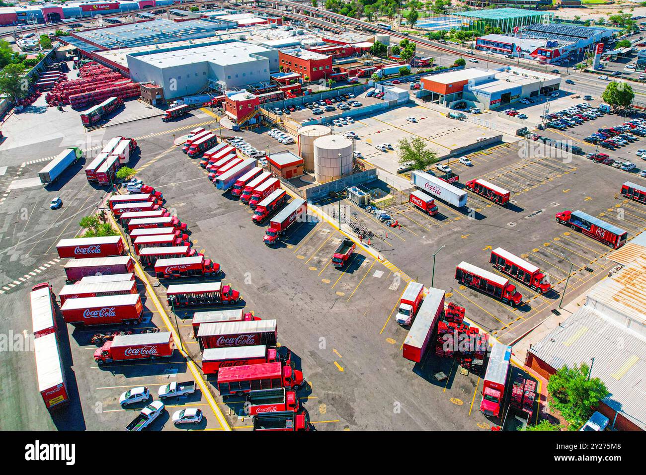 Red Coca Cola trucks or The Coca-Cola Company aerial view of the soda ...