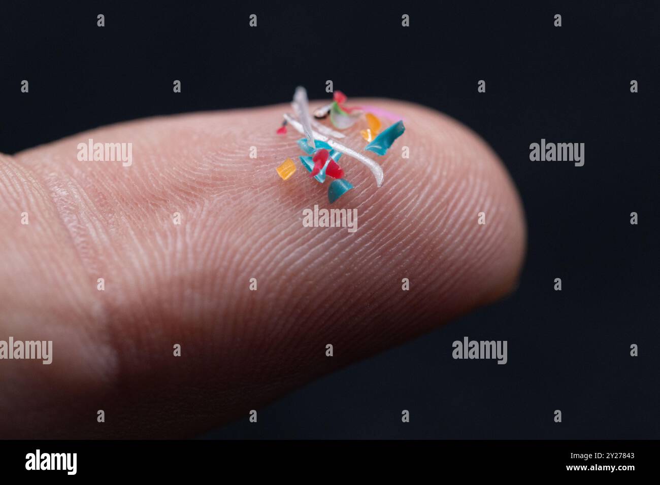 Microplastics on a fingertip Stock Photo - Alamy