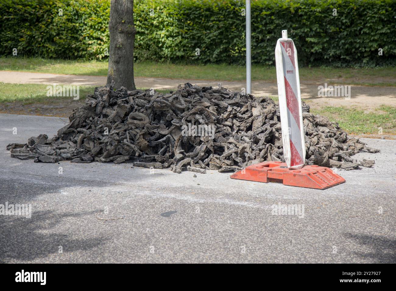 Roadwork: road construction waste with warning sign in Potsdam ...