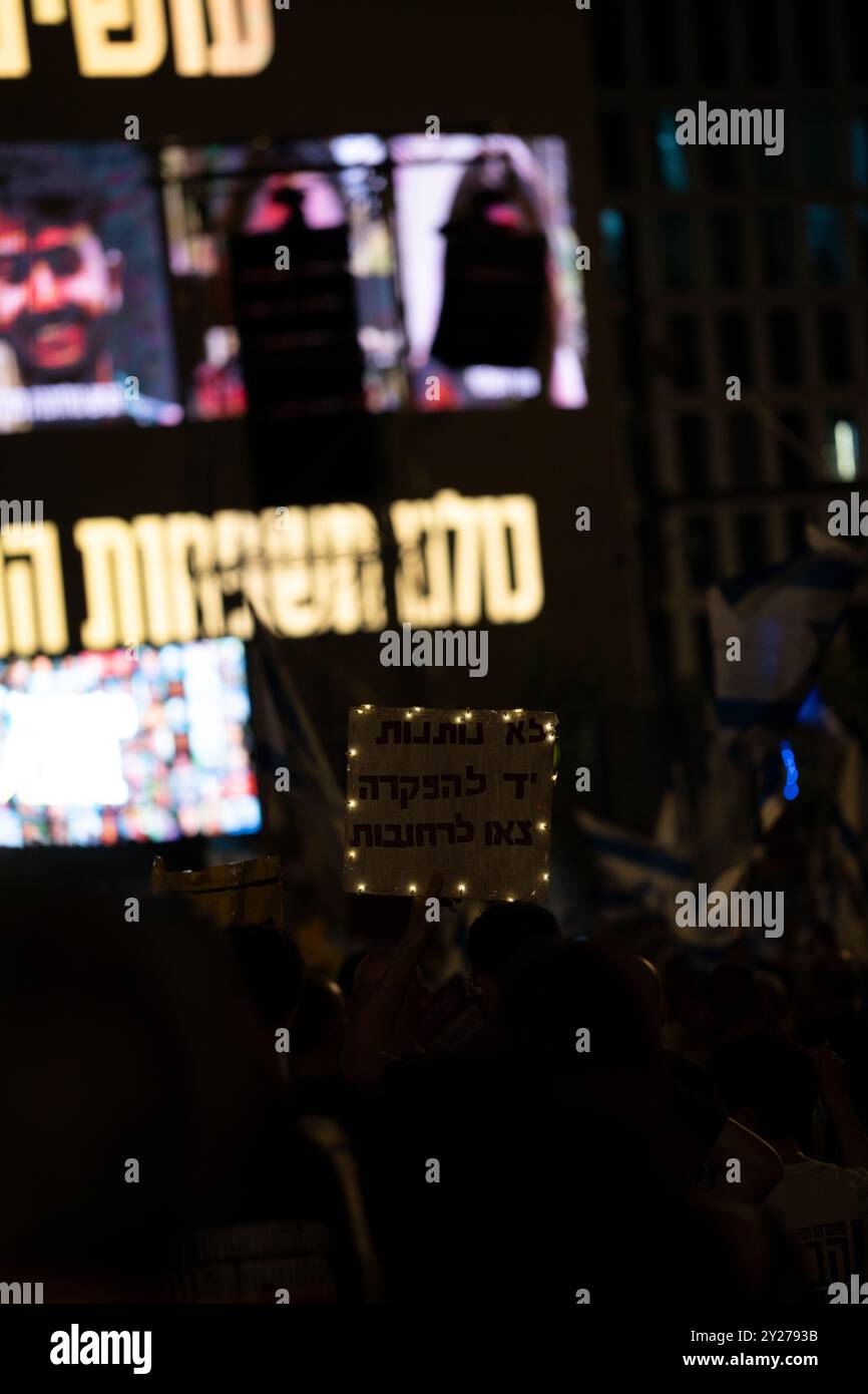 Large yellow protest sign hi-res stock photography and images - Alamy