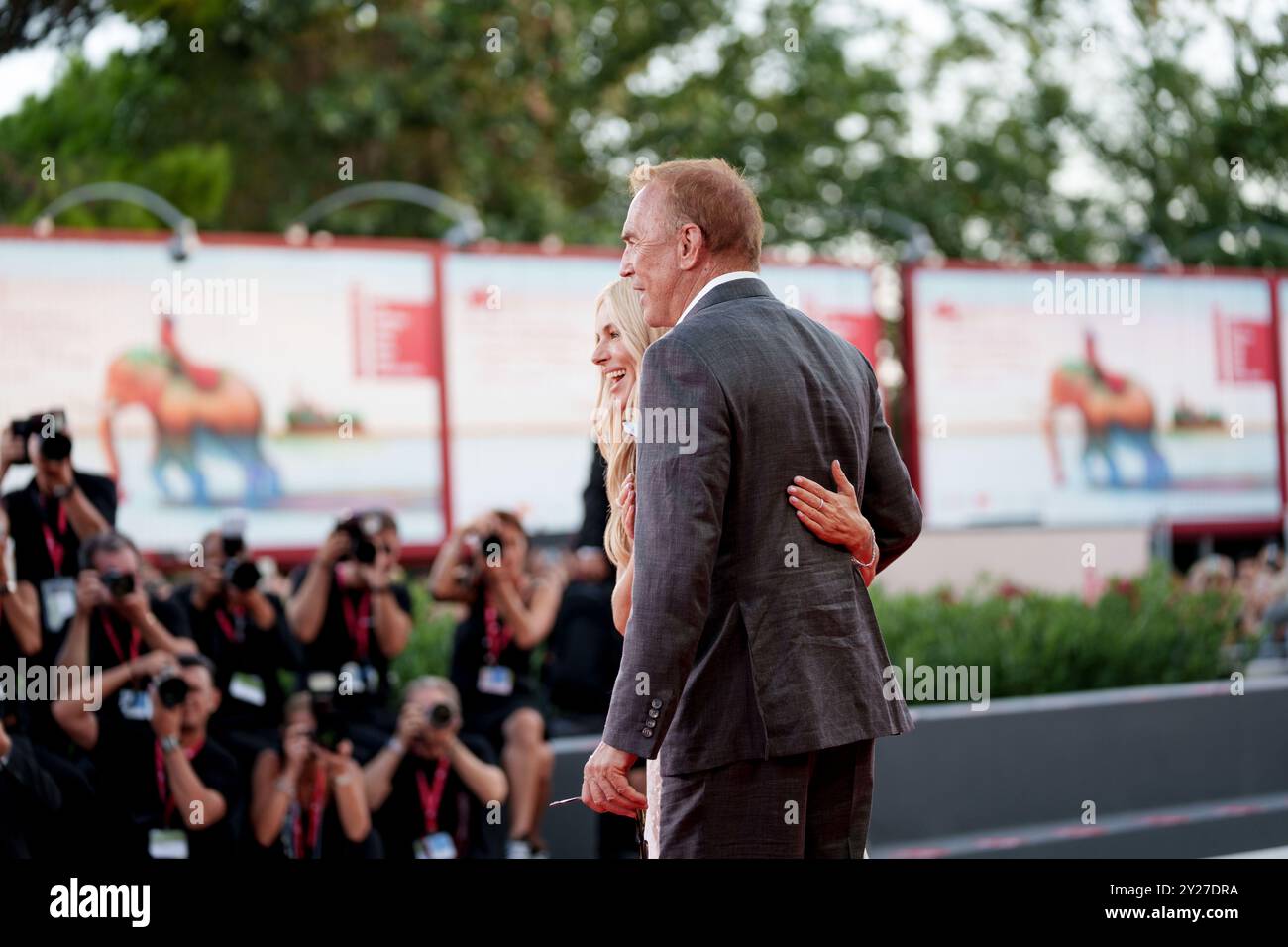 VENICE, ITALY - SEPTEMBER 07: Kevin Costner and Sienna Miller attend ...