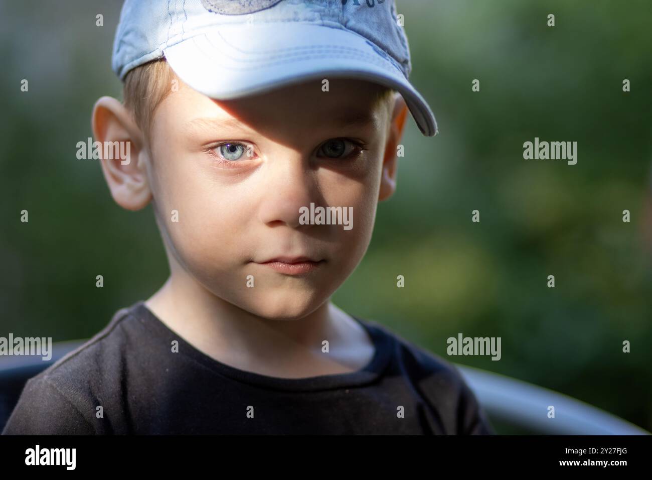 Kid with a cap hi-res stock photography and images - Alamy