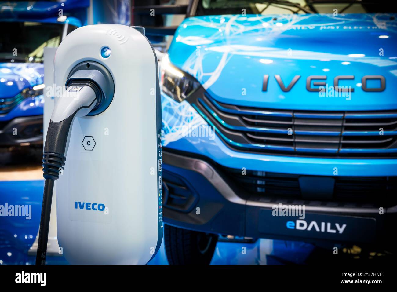 Shell NewMotion electric vehicle charging point in front of the new Iveco eDaily EV transporter ...