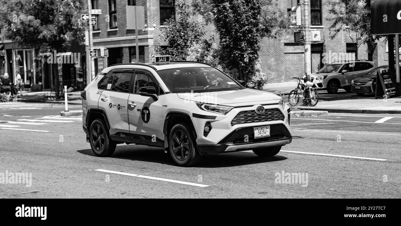 New York City, USA - August 05, 2023: 2019 Toyota RAV4 SUV yellow car ...