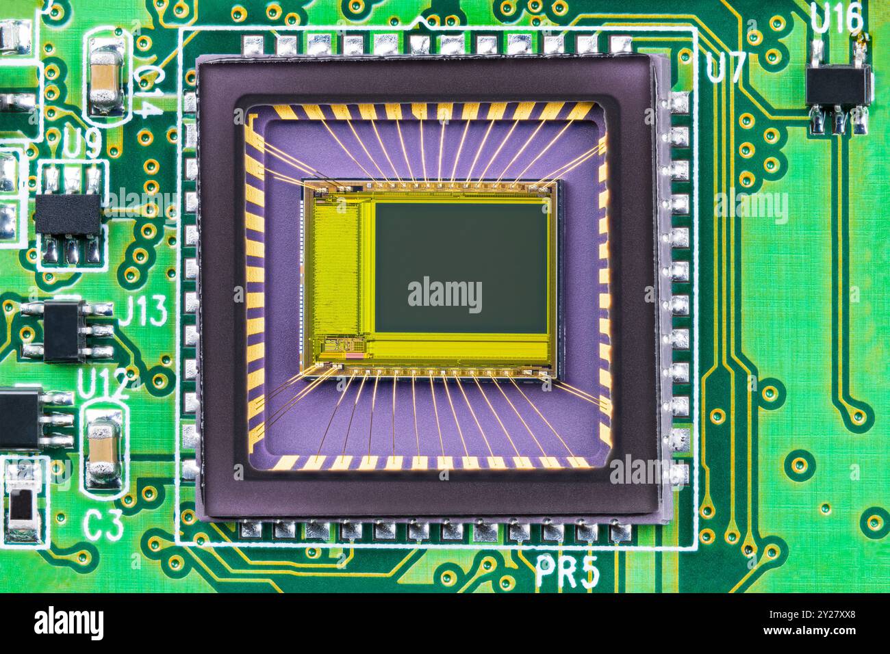 Closeup of image sensor on printed circuit board inside digital camera ...