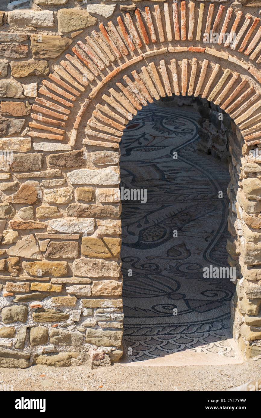 Arch Frame Mosaic in Shadows: Light and Shadow on a Stone Wall ...