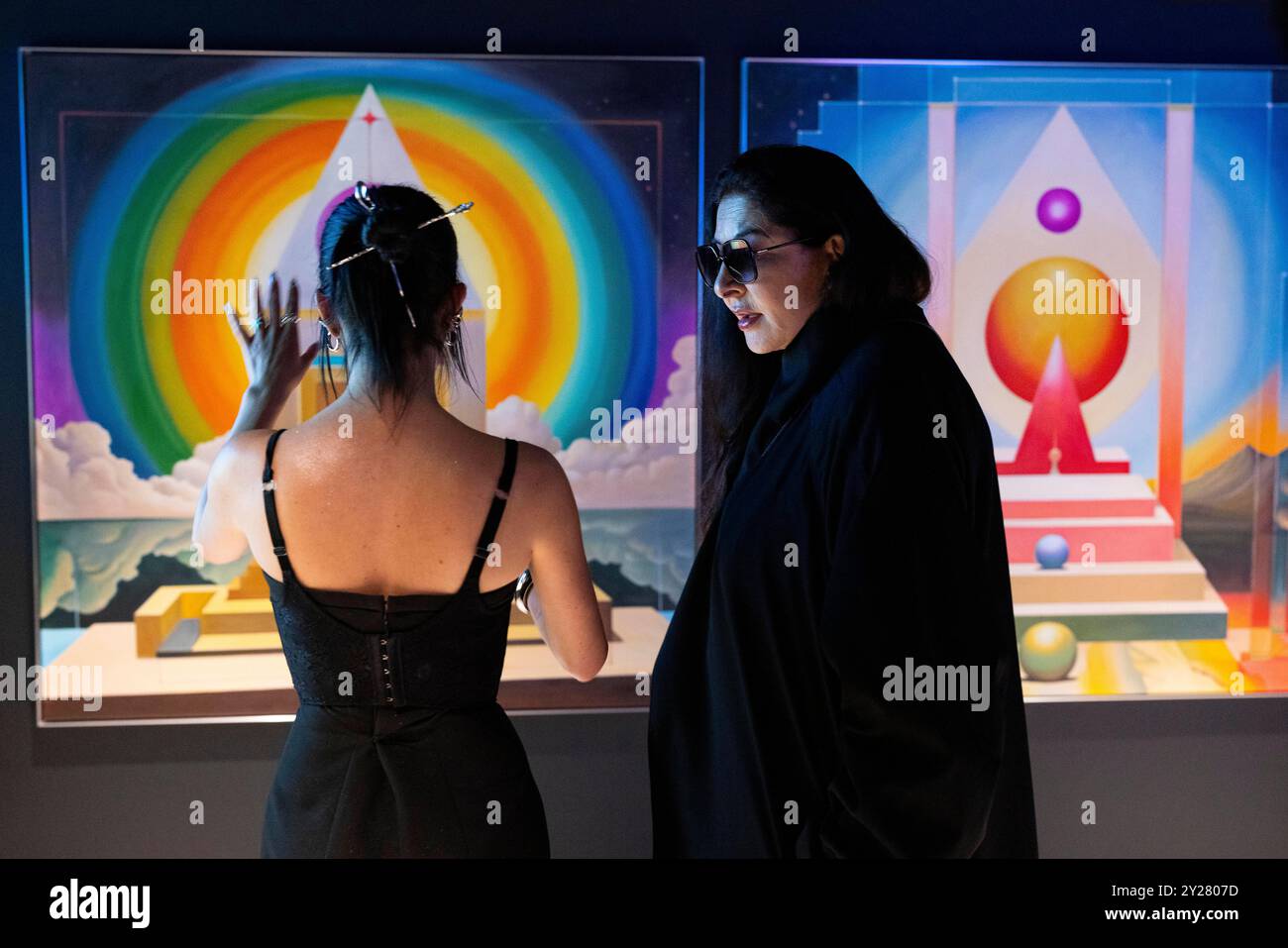 EDITORIAL USE ONLY Marina Abramovic speaks with artist Pilar Zeta during a visit to Moco Museum ...