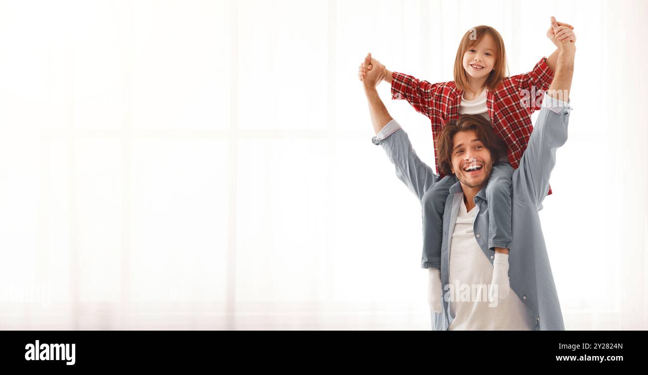 Happy dad and daughter having fun over white background Stock Photo - Alamy
