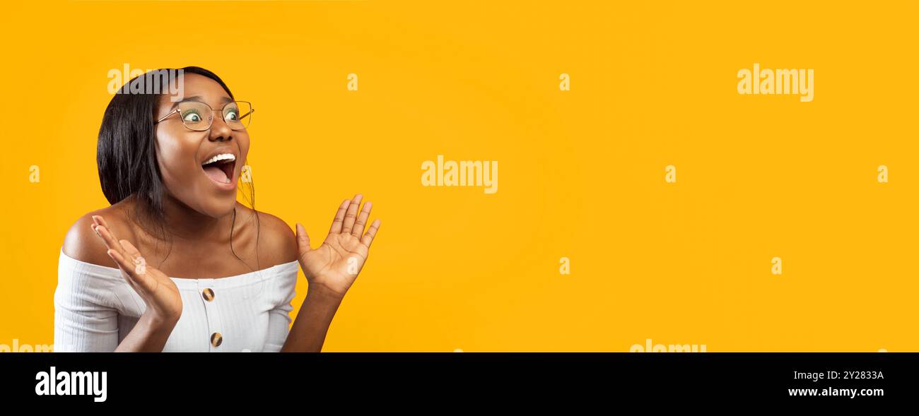 Excited Afro Girl Shouting Standing Over Orange Studio Background ...
