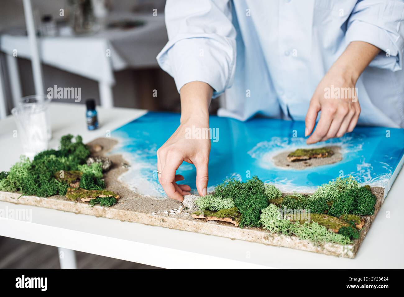 Creating a stunning epoxy resin art piece with a coastal landscape ...