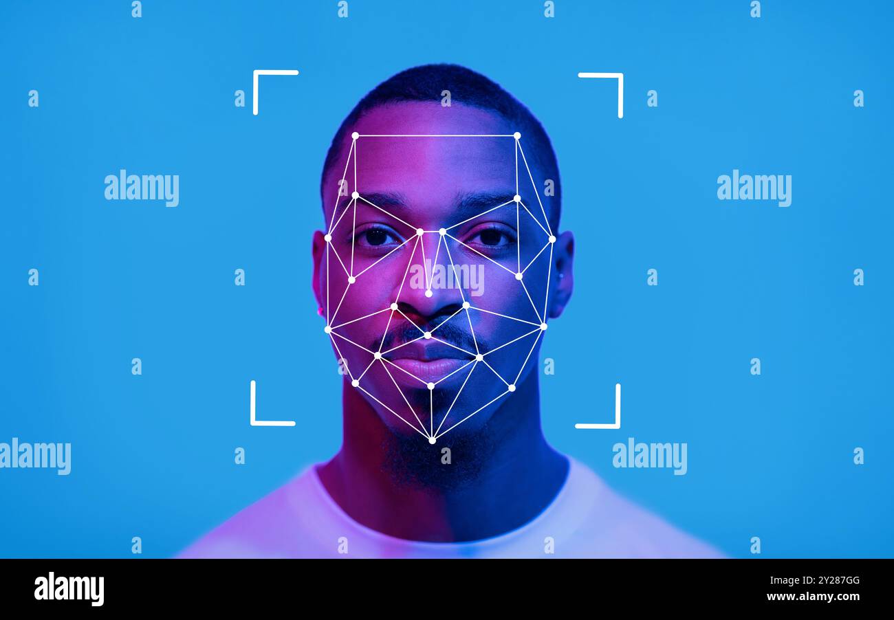Man face highlighted with digital facial recognition overlay in blue ...
